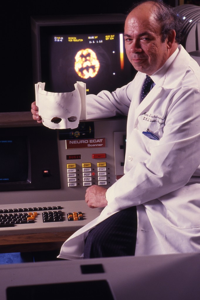 Professor Monte Buchsbaum, B.I.C., with cyclotron. — Calisphere