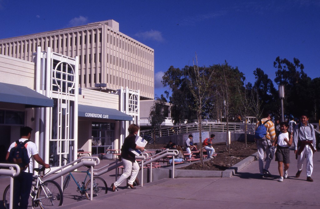 Student Center Plaza area, with students hanging out. — Calisphere