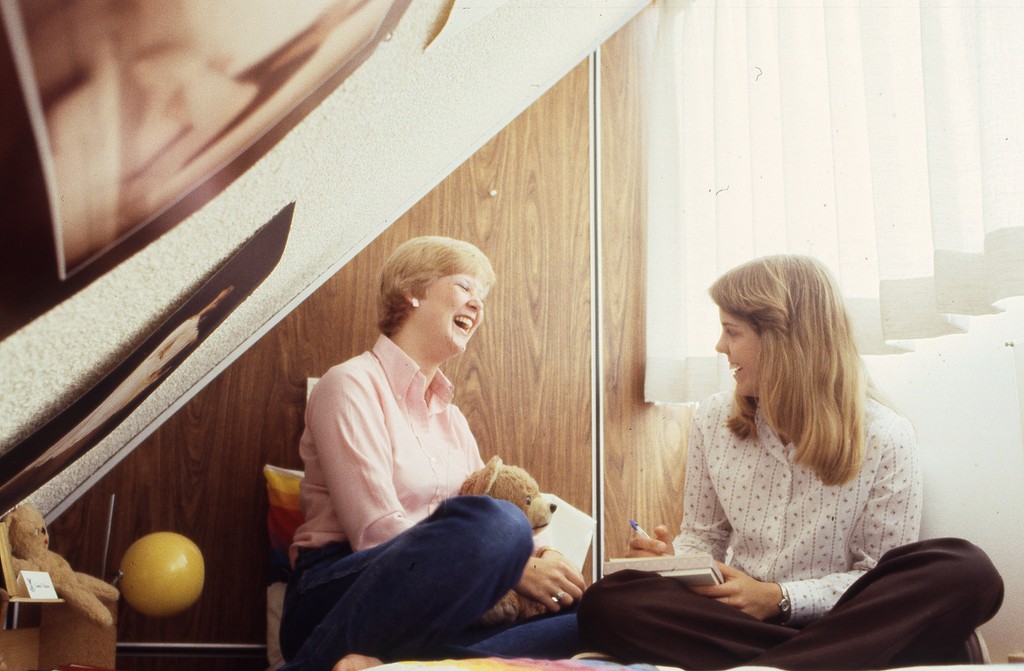 Students hanging out in their dormitories. — Calisphere