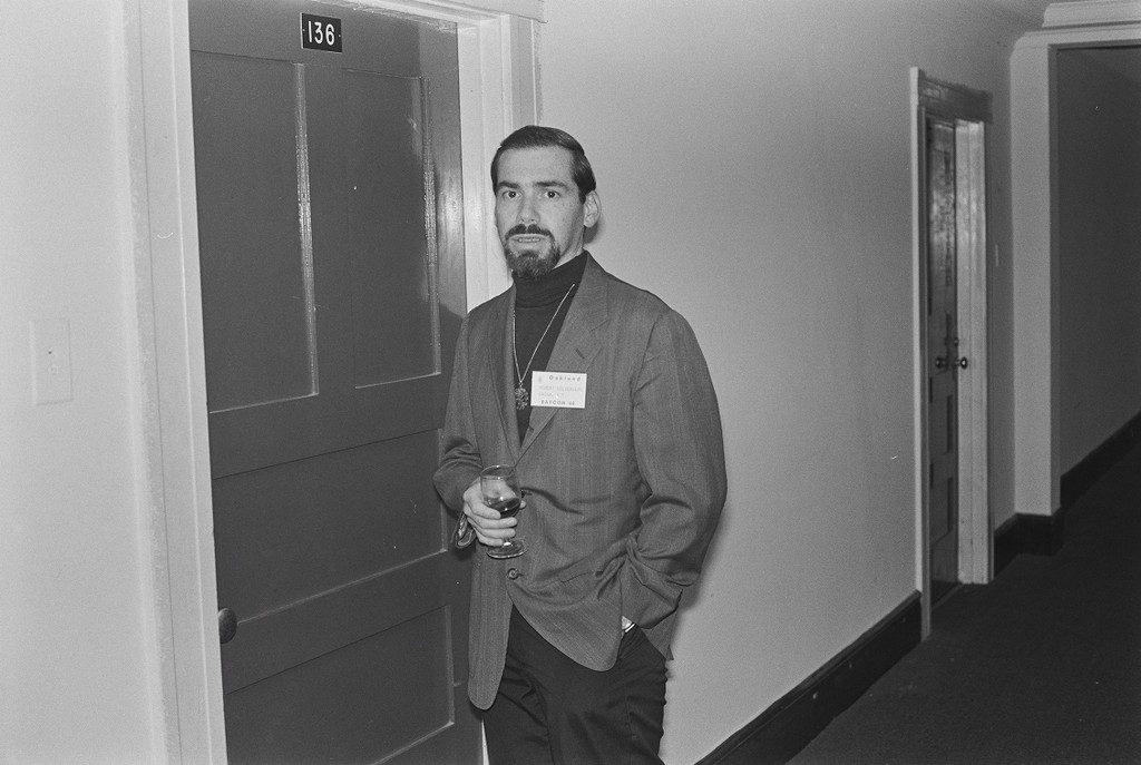 Robert Silverberg in hallway, Baycon — Calisphere