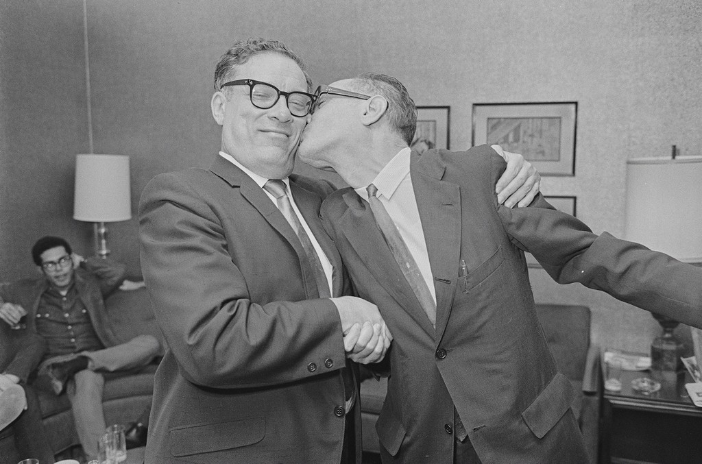 James Blish giving Isaac Asimov a kiss, Nycon 3 — Calisphere