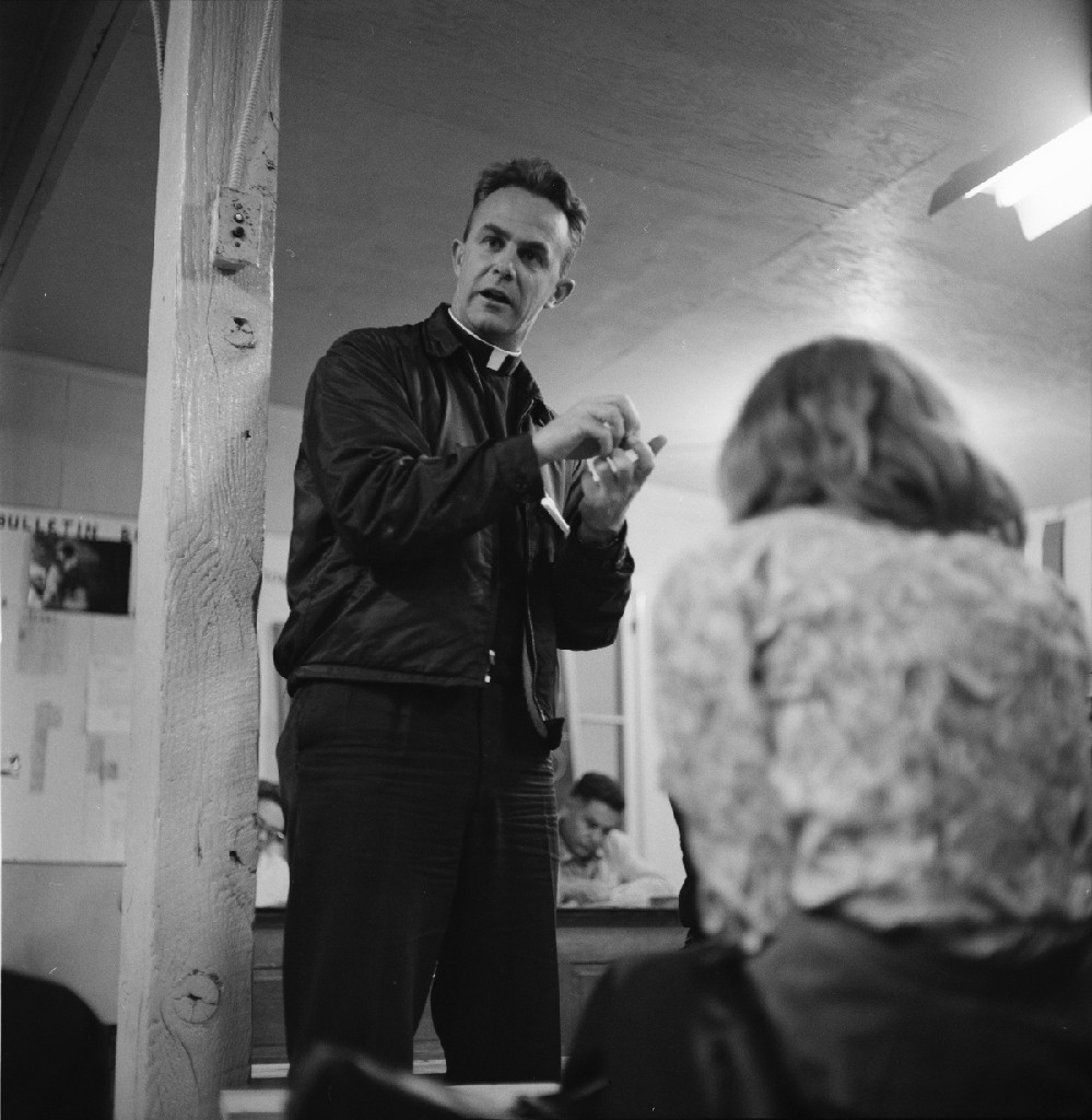 Father Thomas McCullough speaking at AWOC Conference — Calisphere