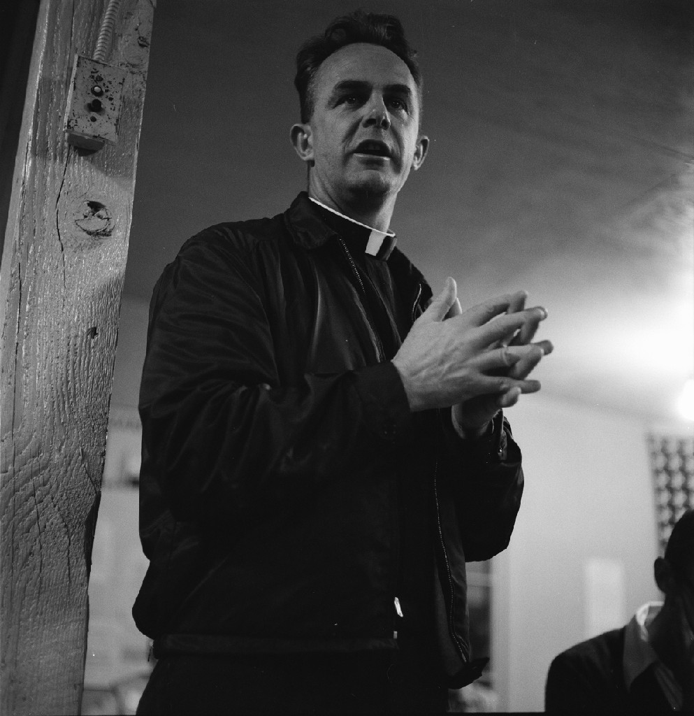 Father Thomas McCullough speaking at AWOC Conference — Calisphere