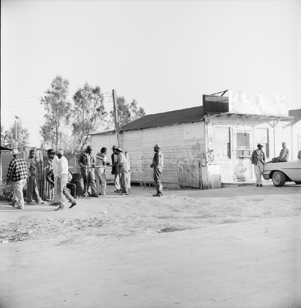 People milling around outside — Calisphere