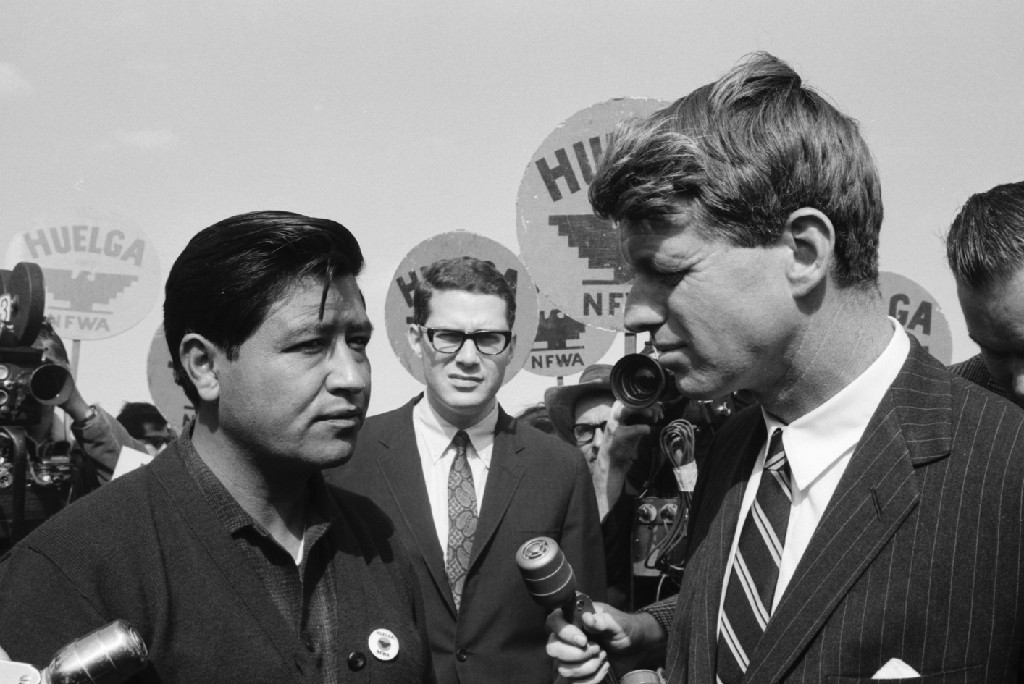 Cesar Chavez & Senator Bobby Kennedy talking outside — Calisphere