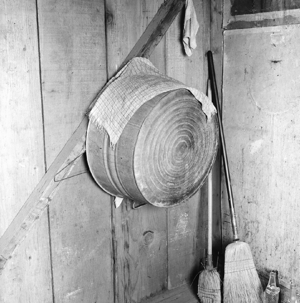 Washtub hanging on wall — Calisphere