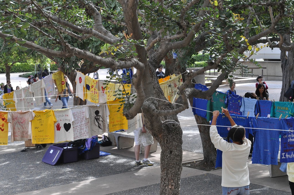 Students hanging up t-shirts for Campus Assault Resources and Education ...