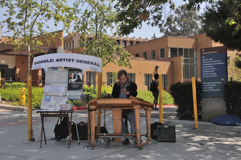 Michael Masley playing a cimbalom on the Ring Mall; photograph at ...