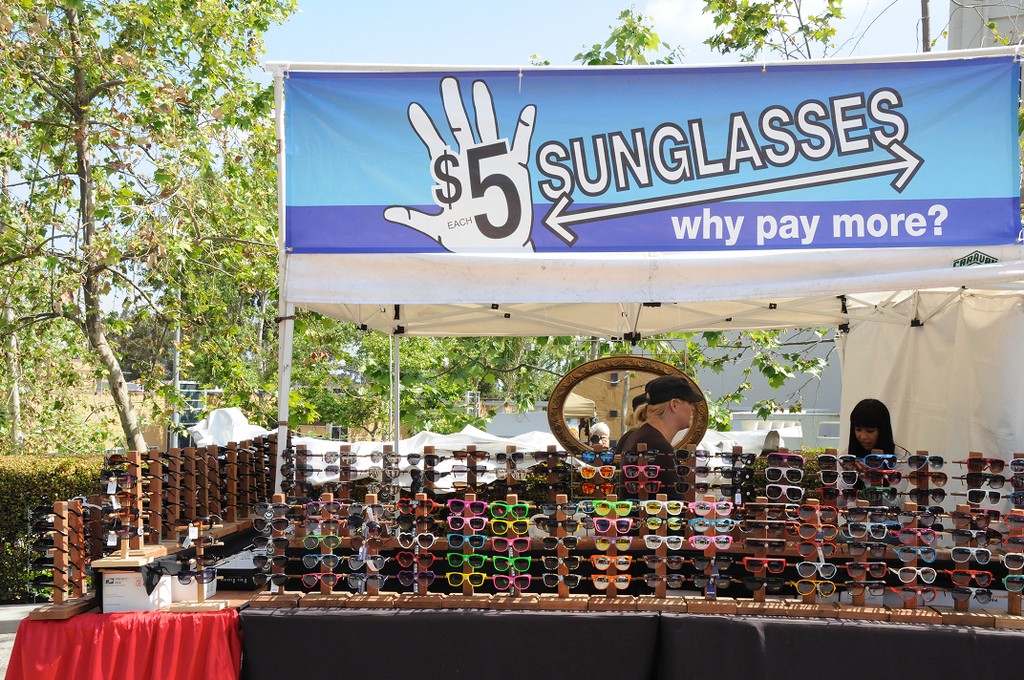 Sunglasses vendor booth set up on the Ring Mall; photograph at ...